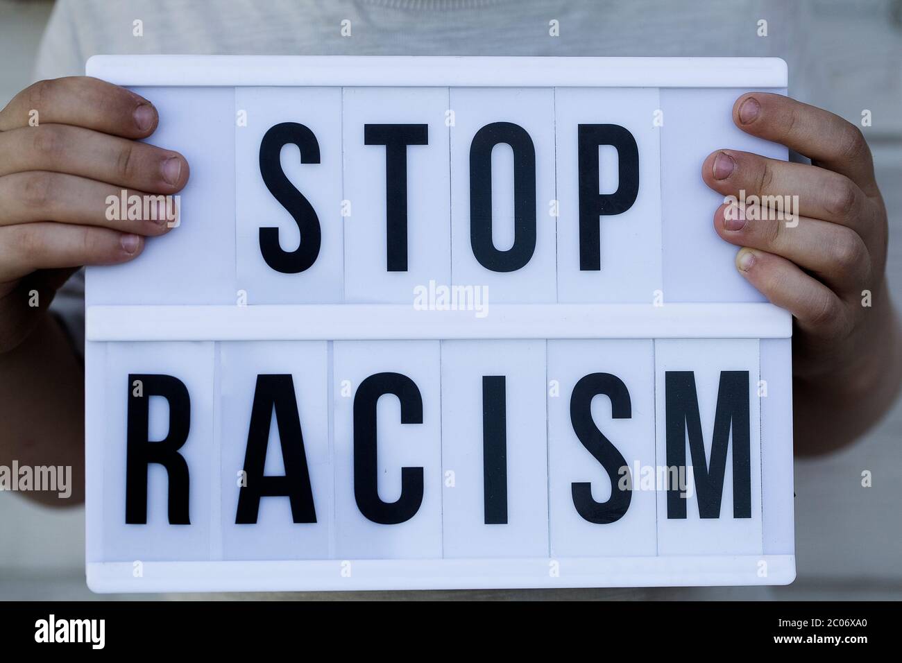 Stop racism hands paper hi-res stock photography and images - Alamy