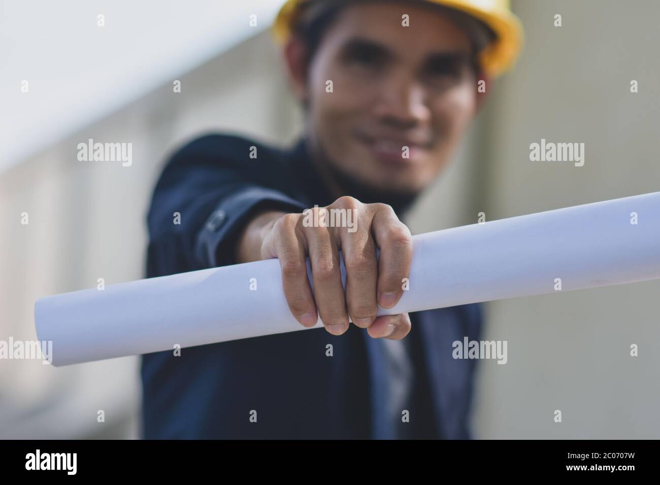 businessman holding blueprint building estate construction Stock Photo ...