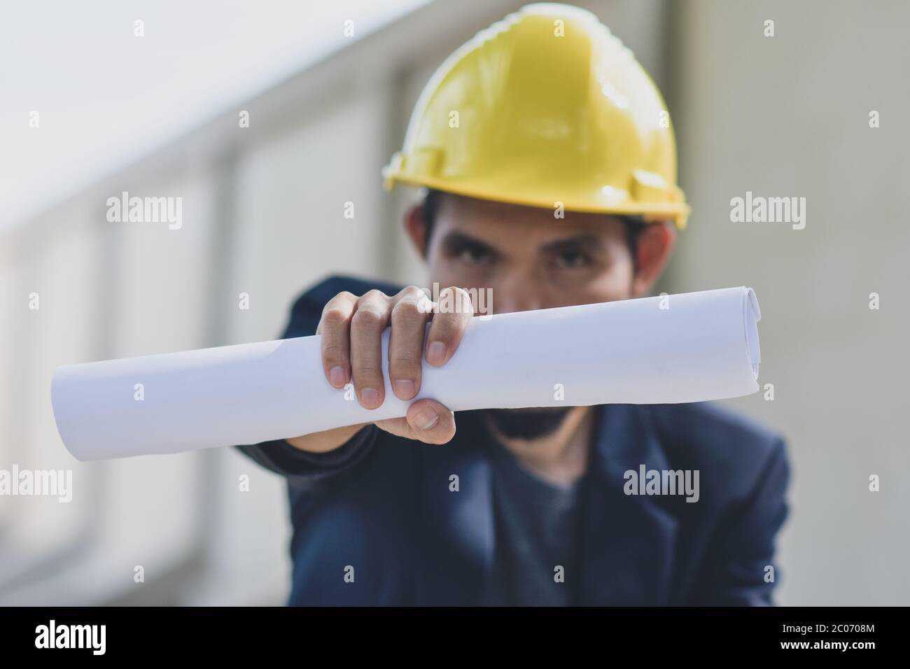 businessman holding blueprint building estate construction Stock Photo ...