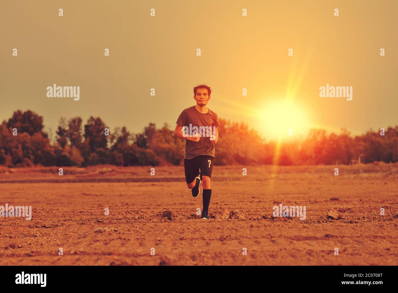 Man running on road hi-res stock photography and images - Alamy
