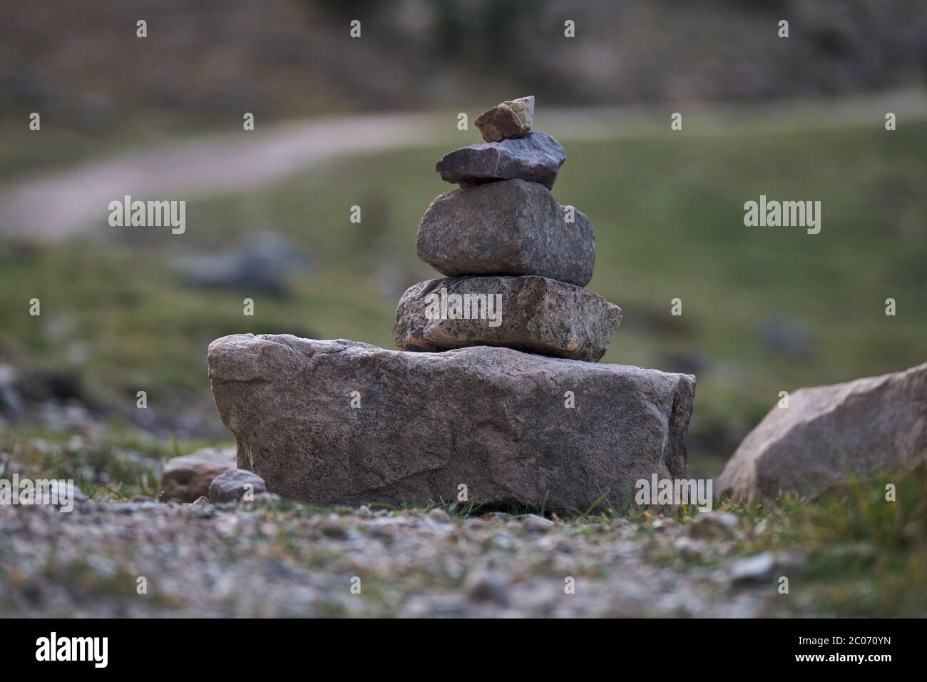 Some stones for guide the correct path to the mountaineers Stock Photo ...