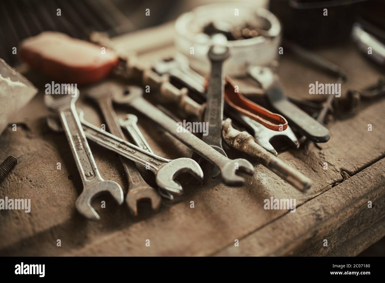 Old work tools in garage closeup Stock Photo - Alamy