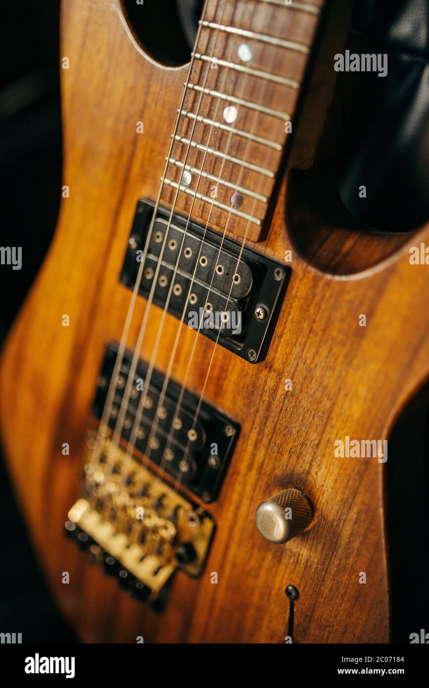 Wooden electric guitar details closeup Stock Photo - Alamy