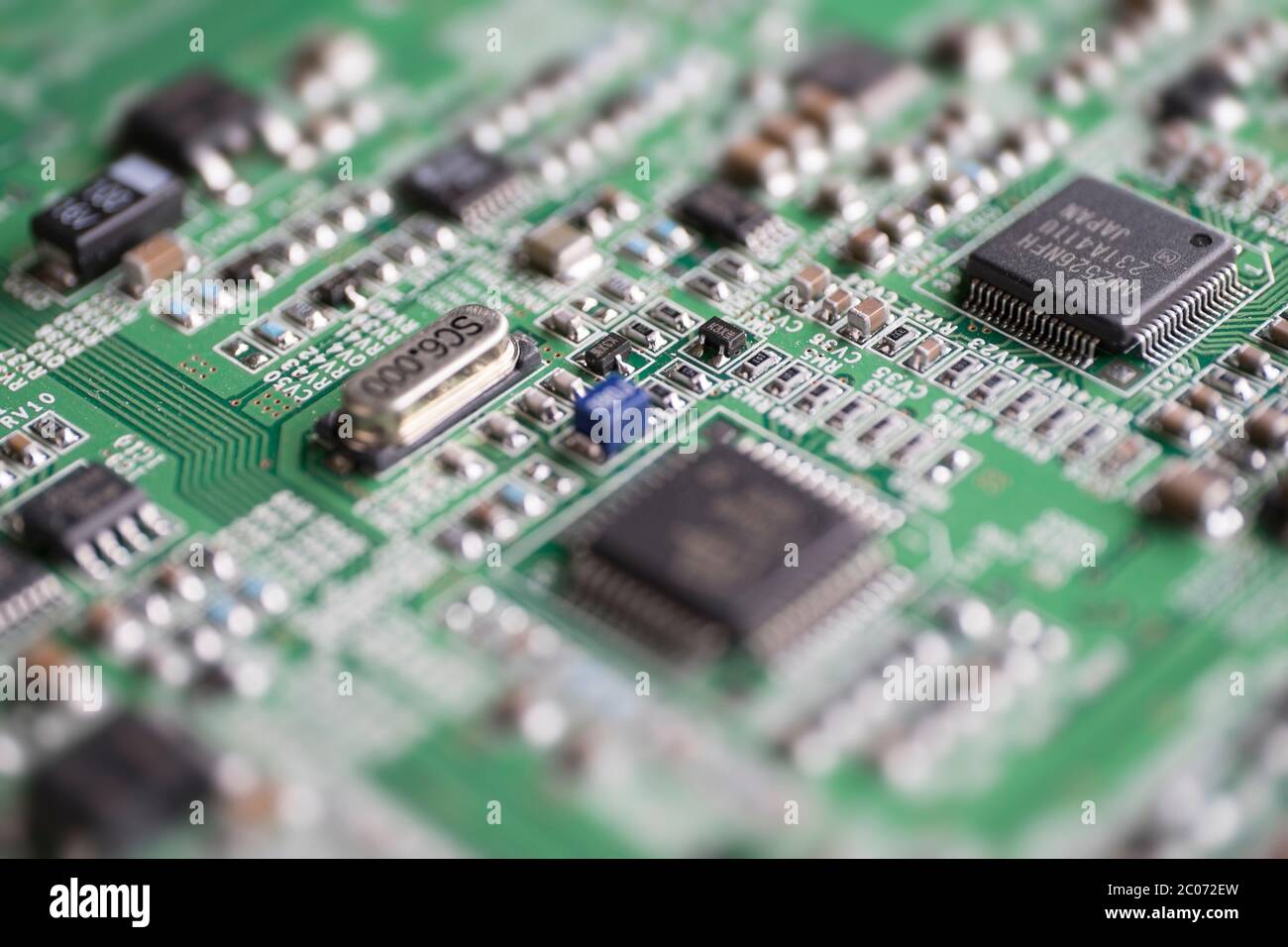 Detail of an electronic printed circuit board with many electrical ...