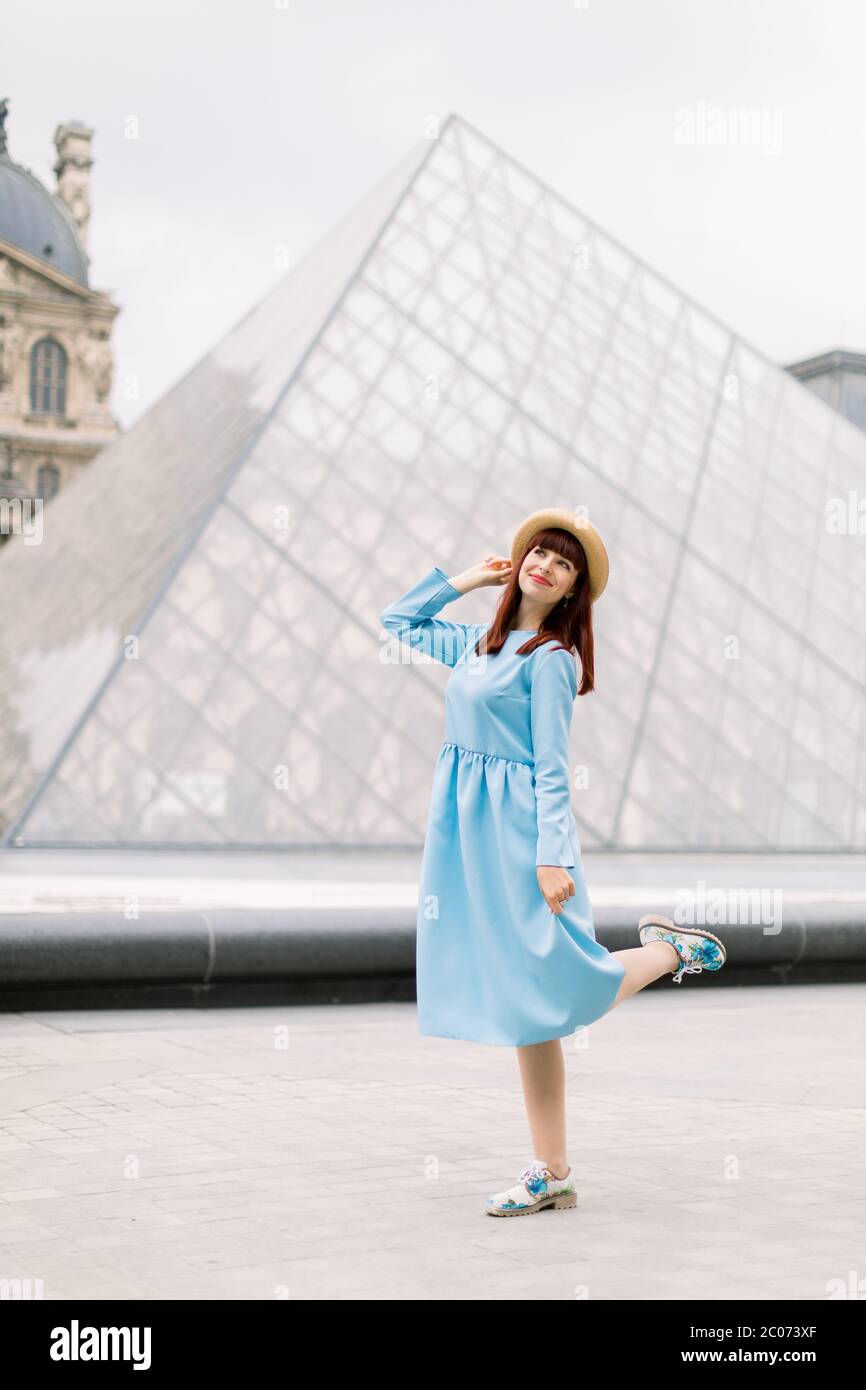 PARIS, FRANCE - September 17, 2019: Young woman tourist in straw hat ...
