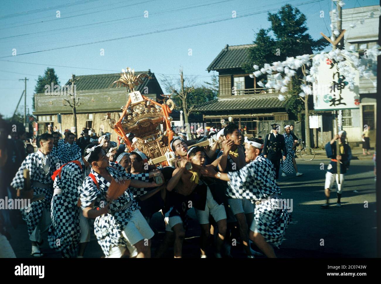 [ 1950s Japan - Shinto Festival ] — Young Japanese men heaving a ...
