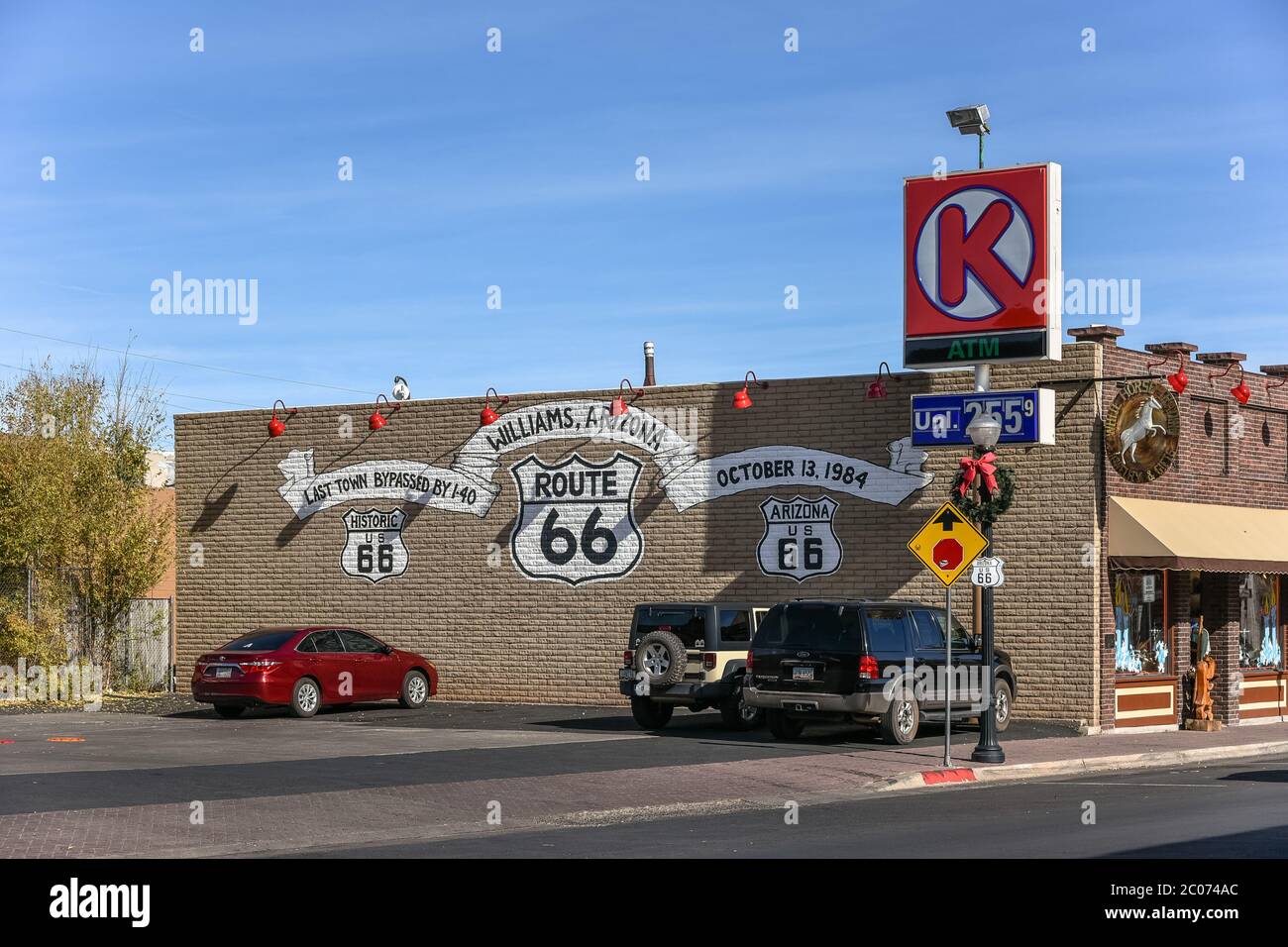 A Route 66 mural on a wall at a Circle K gas station in Williams ...