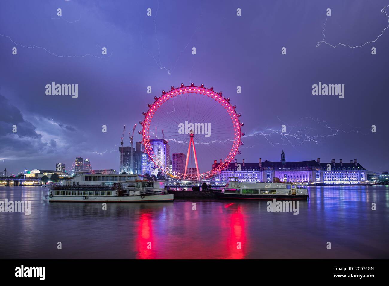 Lightning storm over the London Eye over looking the River Thames Stock ...