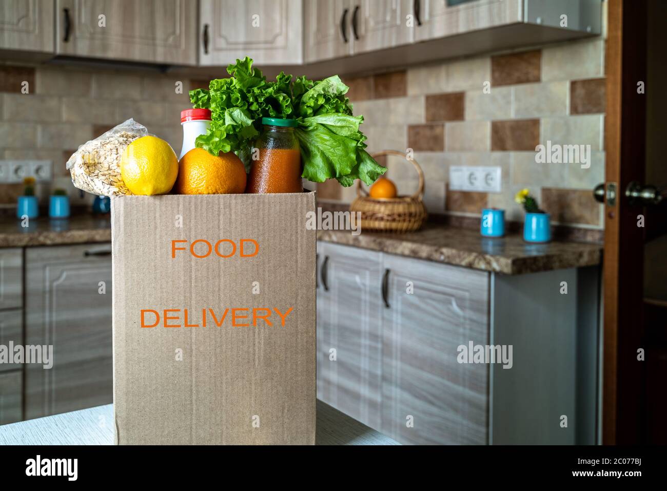 Safe food delivery to your home. A box with various products-milk ...