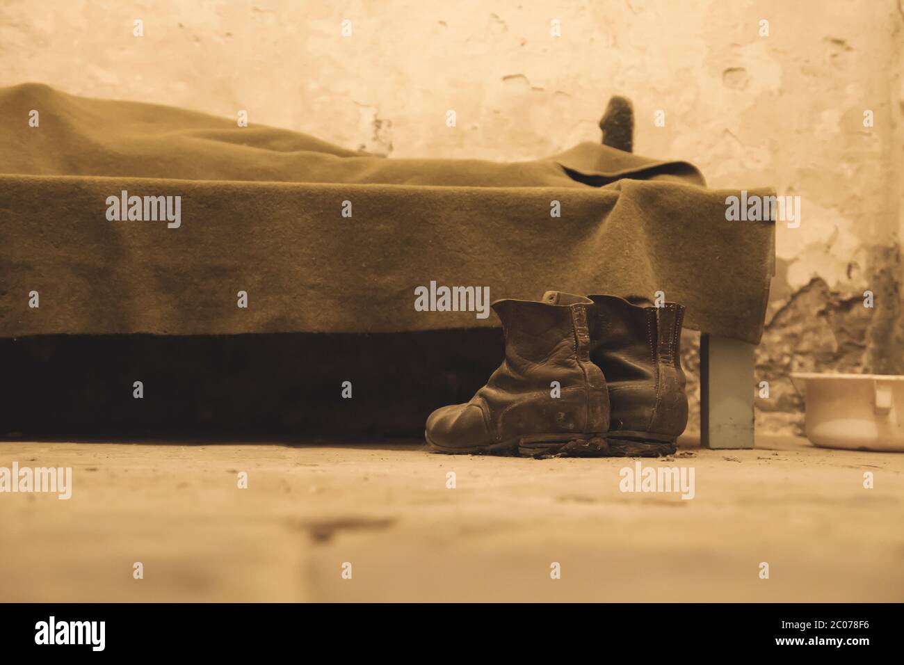 Old books beside a humble bed Stock Photo - Alamy