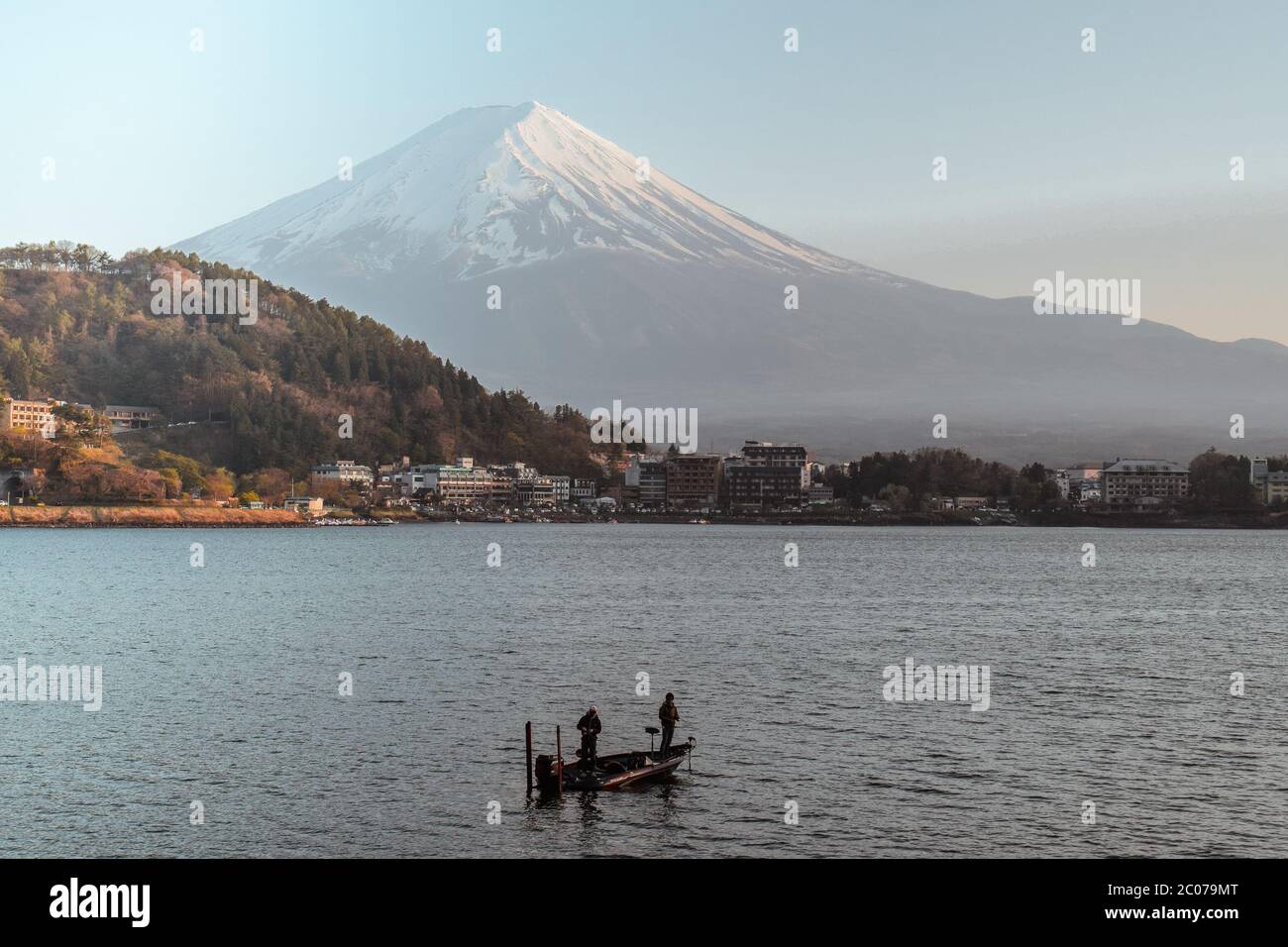 Fisherman on a boat fishing on Lake Kawaguchi in front of Mount Fuji in Kawaguchiko Japan Stock ...