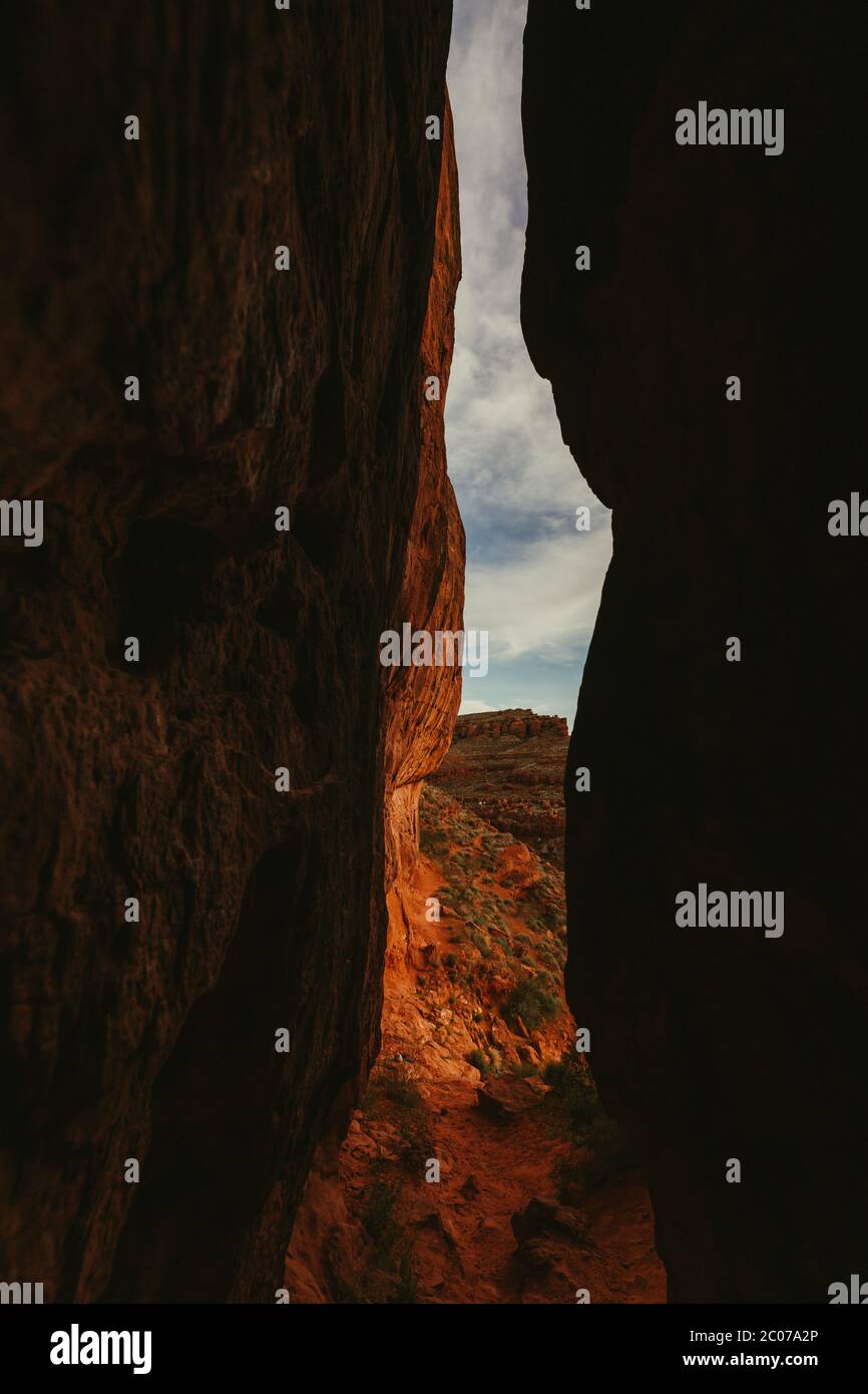 vertical slit of orange canyon walls in the utah desert Stock Photo - Alamy