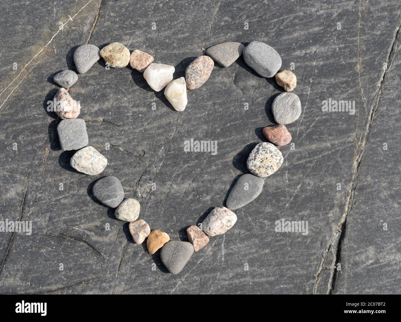 heart made of pebbles Stock Photo - Alamy