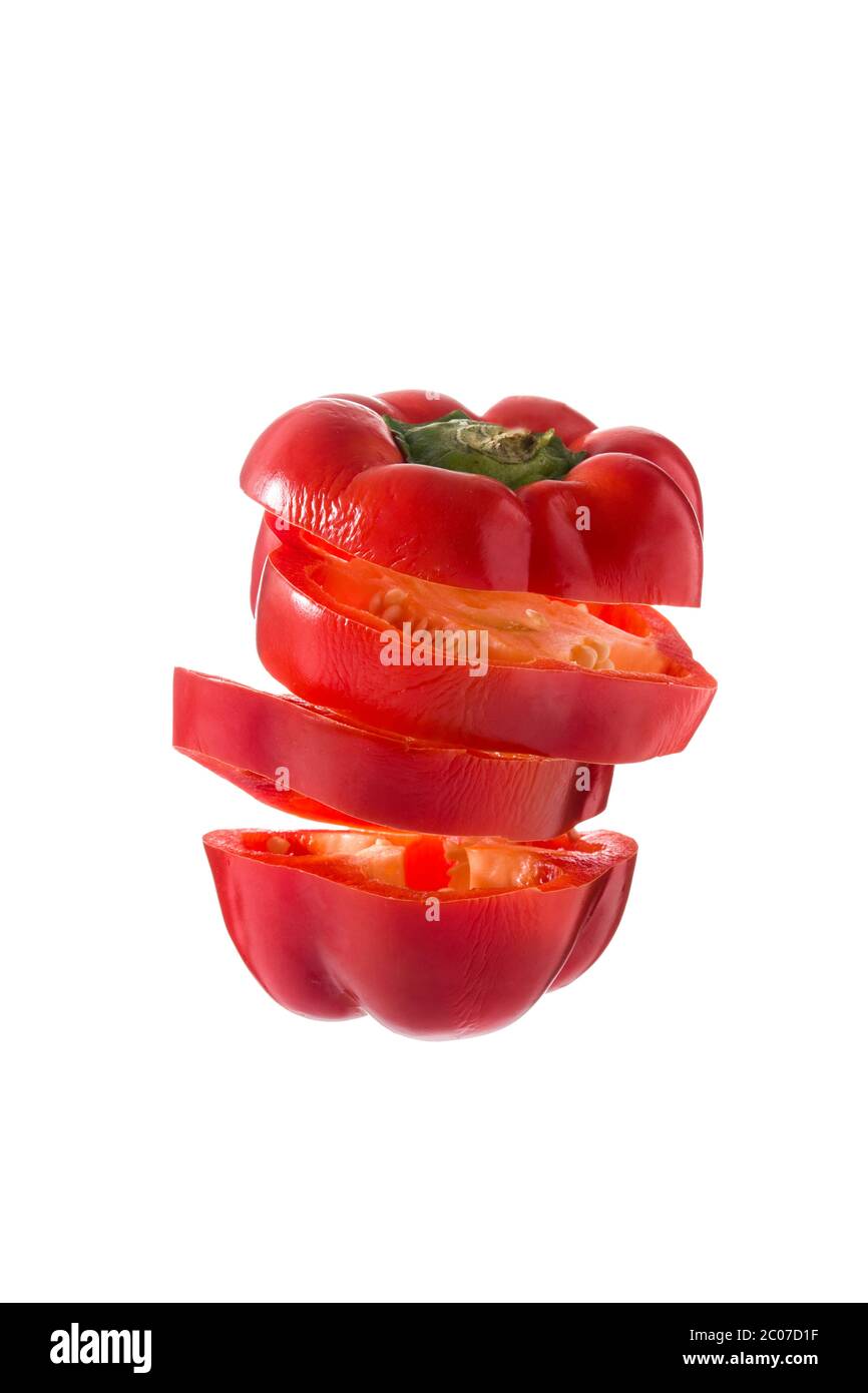 Sliced fresh red pepper cut isolated on white background Stock Photo ...