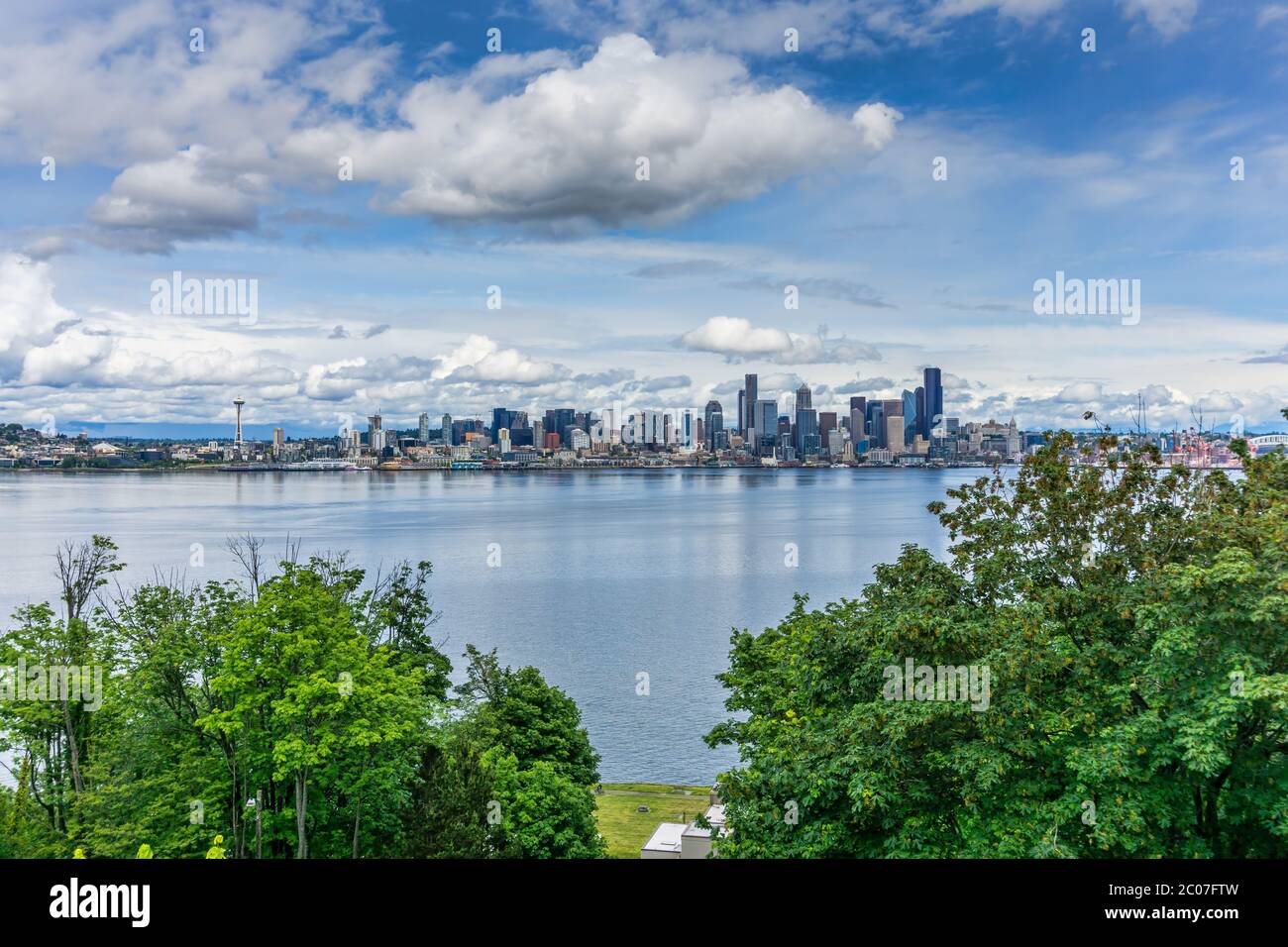 Fluffy clouds hover over Seattle, Washington Stock Photo - Alamy