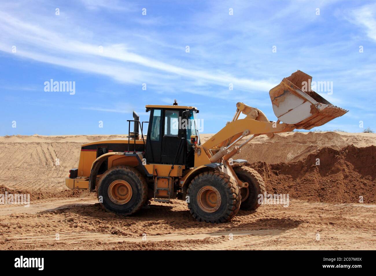 Yellow Bulldozer at Construction Desert Chanel Stock Photo - Alamy