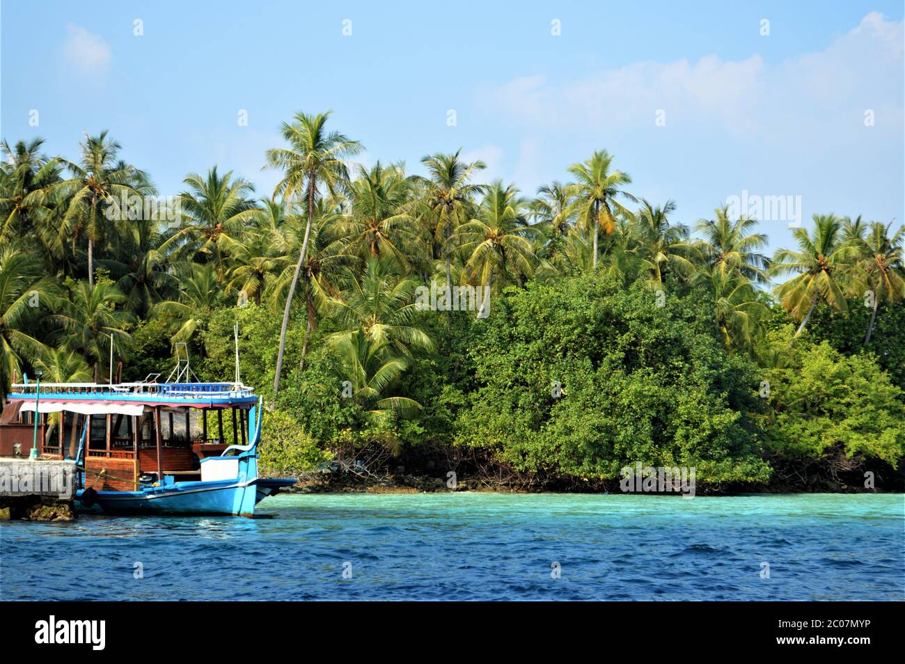 amazing view of fishing boat and landscape of tropical island of ...