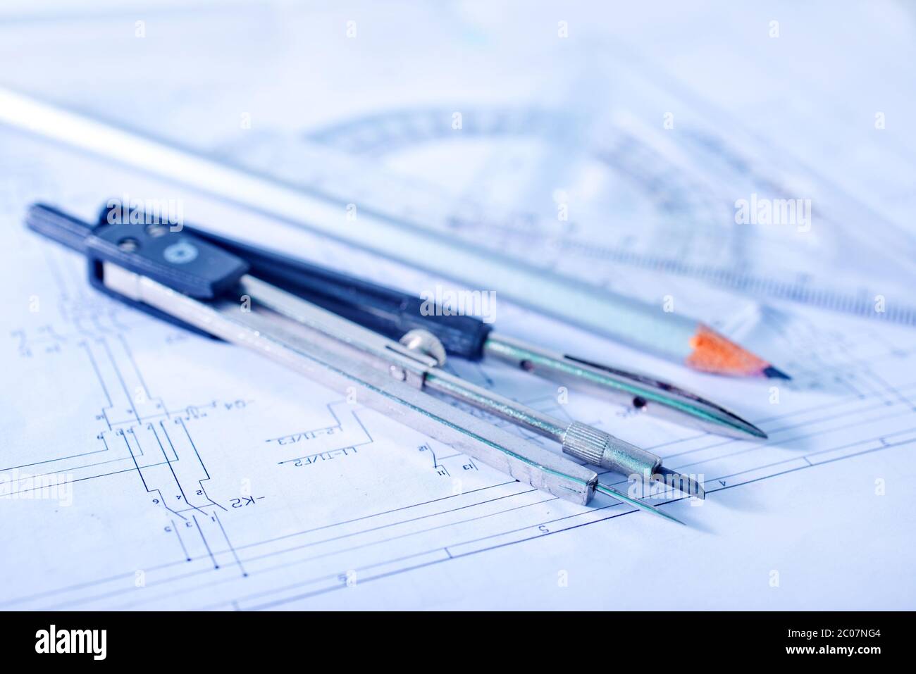 Compass and ruler lie on the drawing Stock Photo - Alamy