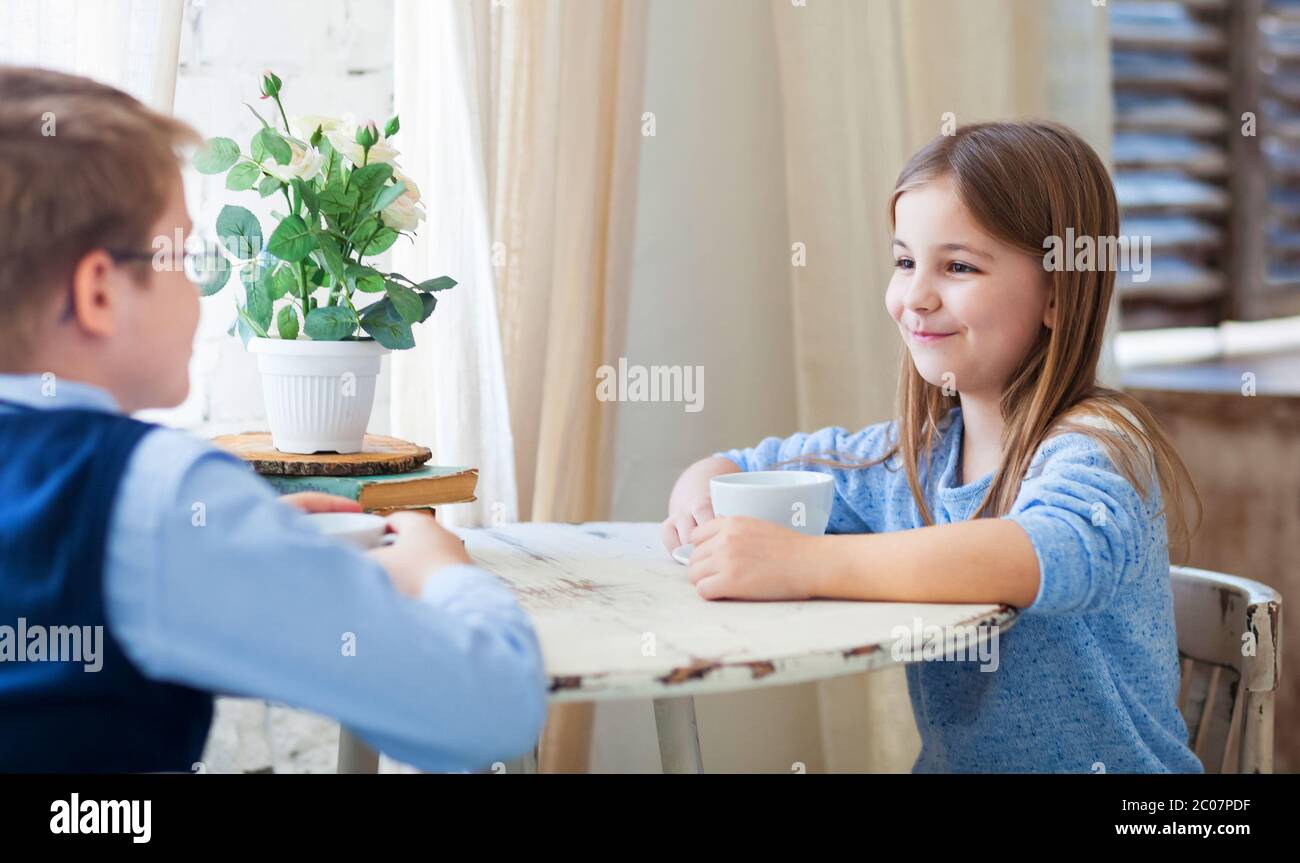 Little boy drinking tea hi-res stock photography and images - Alamy