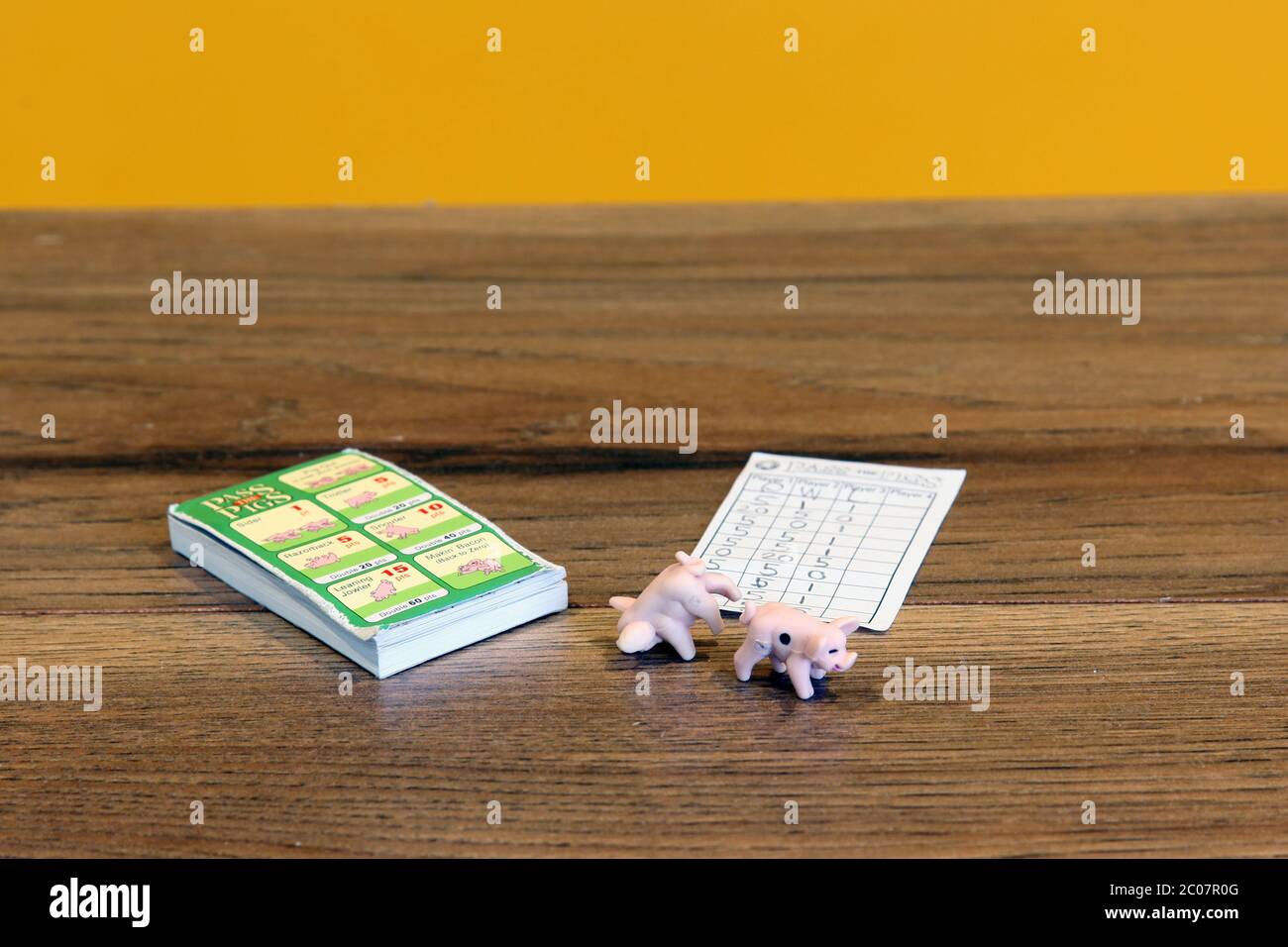 Pass the Pigs children's dice game pieces Stock Photo - Alamy
