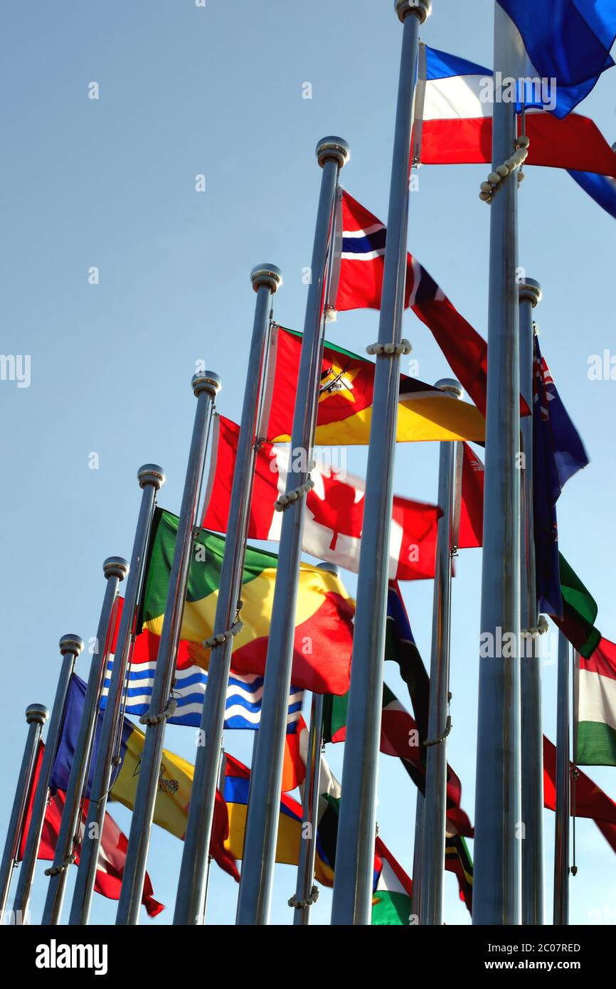 Different countries flags united together against blue sky Stock Photo ...
