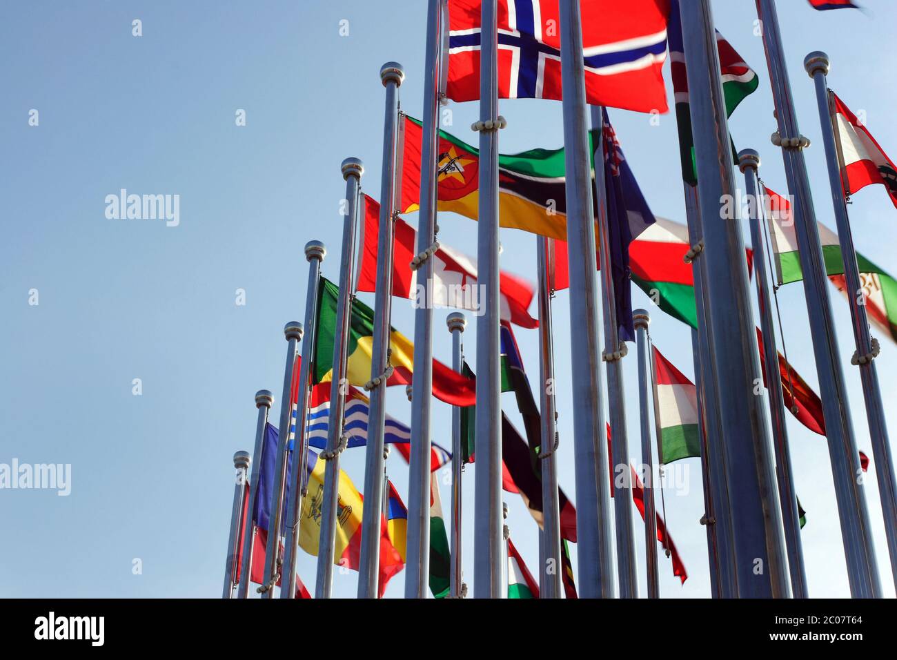 Different countries flags united together against blue sky Stock Photo ...