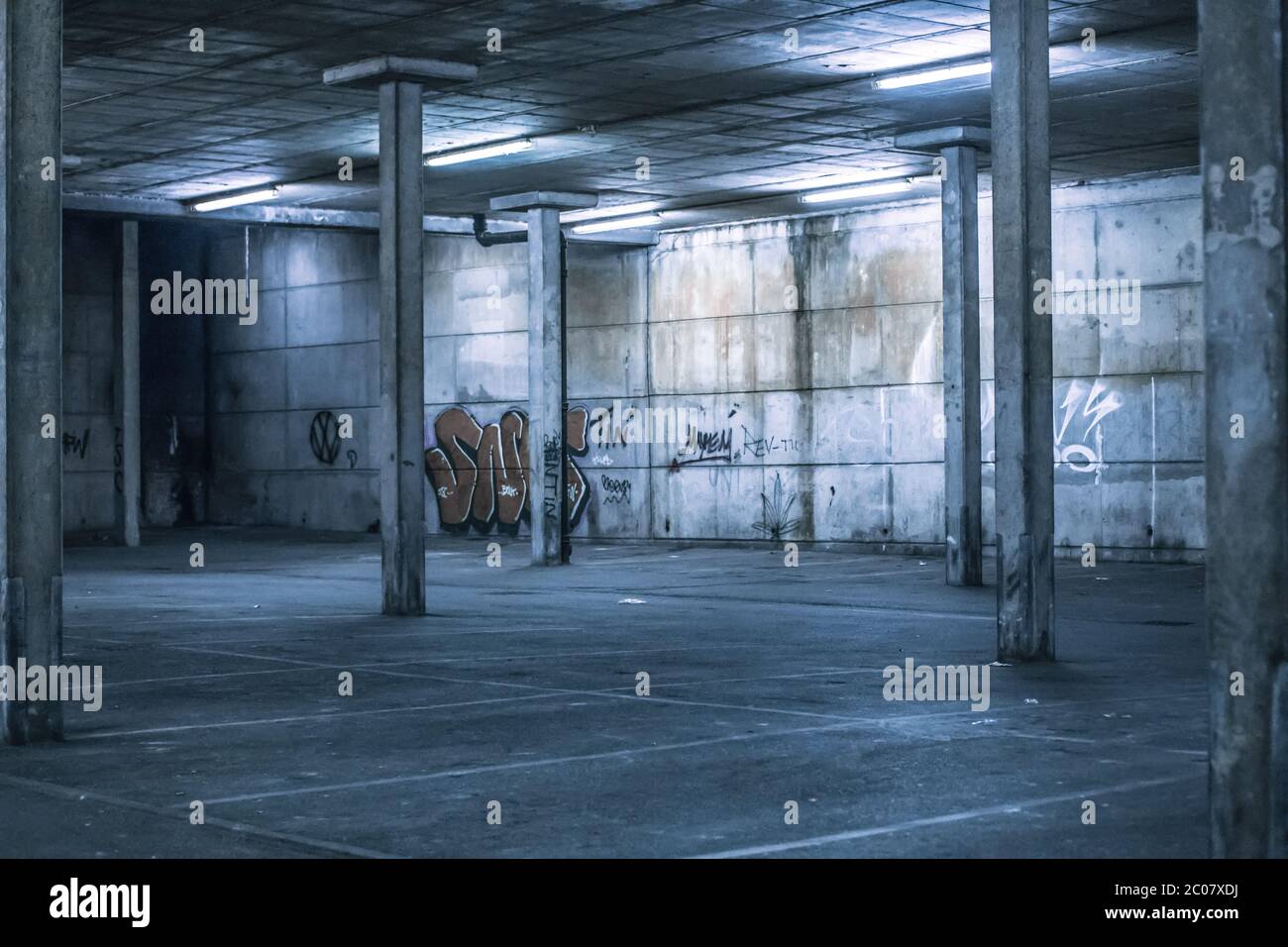 Interior of an undercover parking area Stock Photo - Alamy