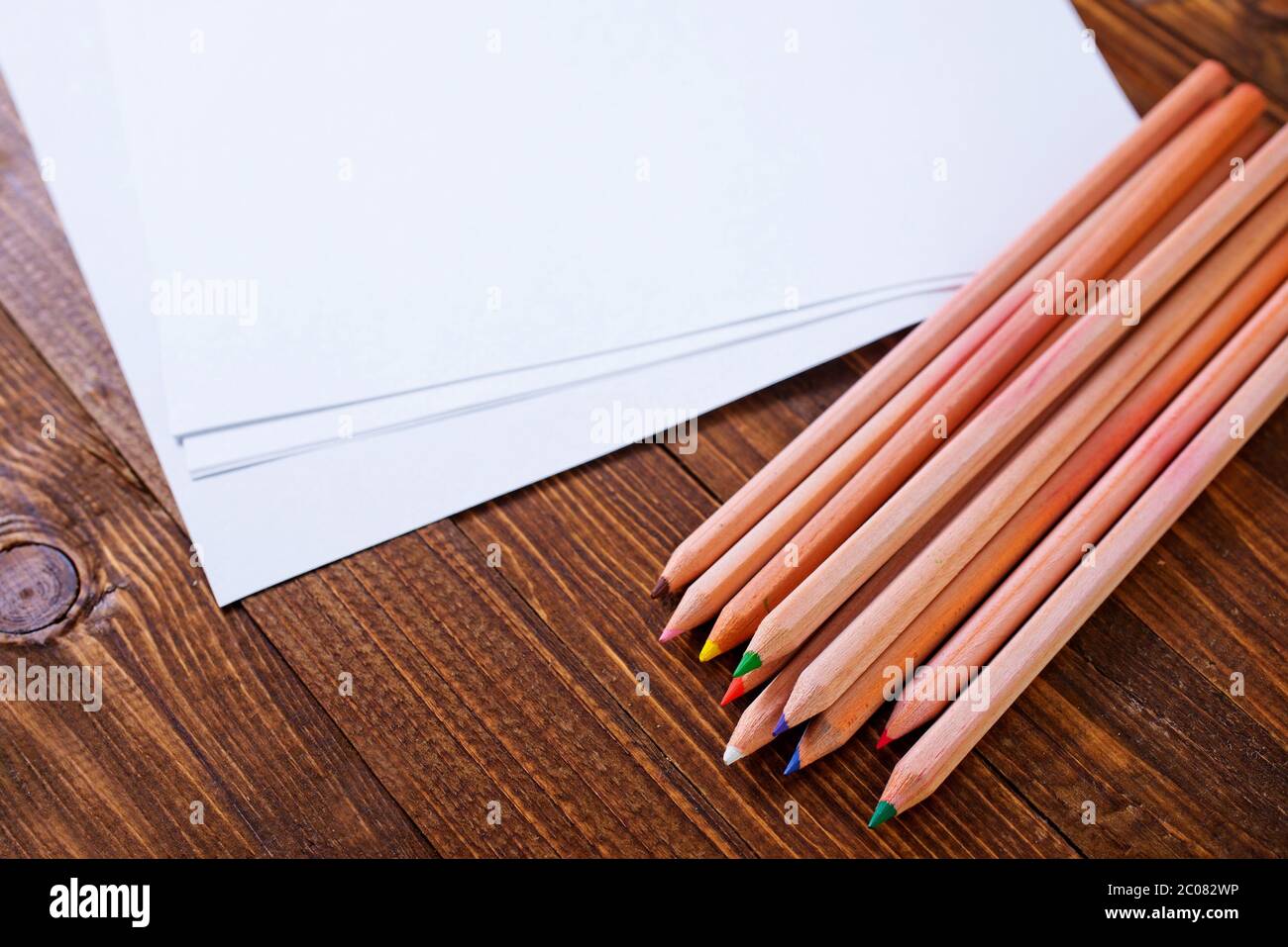 paper and color pencils Stock Photo - Alamy