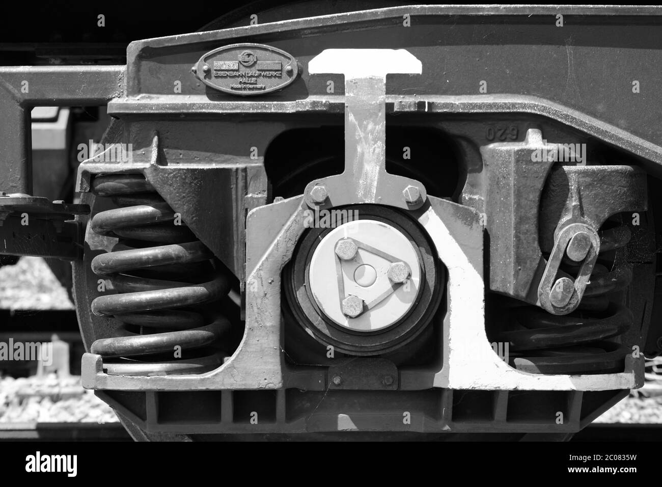 Vintage victorian railway track with huge train wheels in close up ...