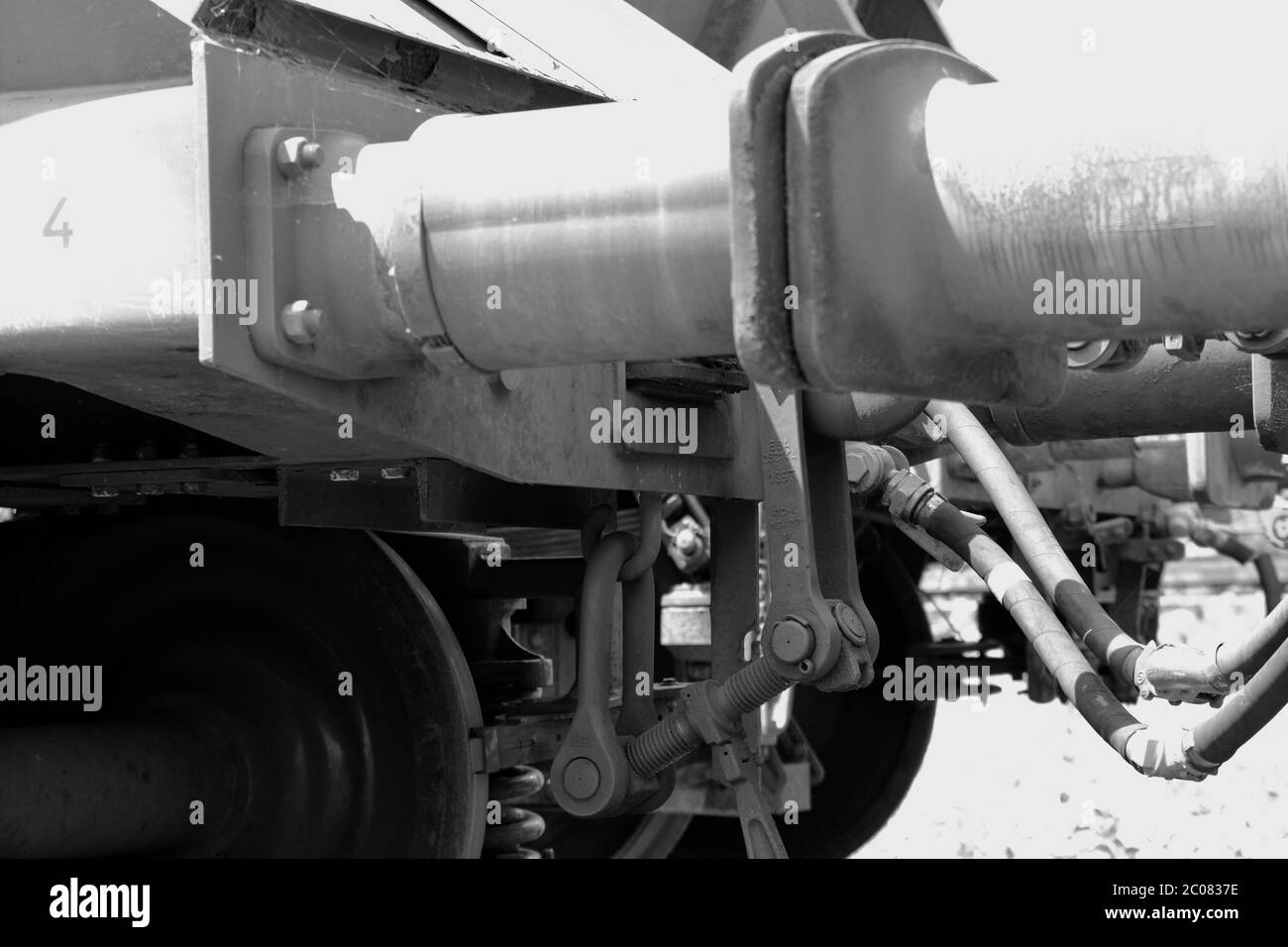 Vintage victorian railway track with huge train wheels in close up ...