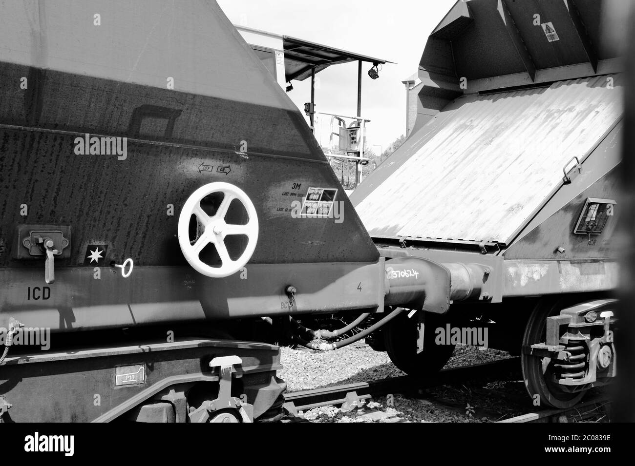 Vintage victorian railway track with huge train wheels in close up ...