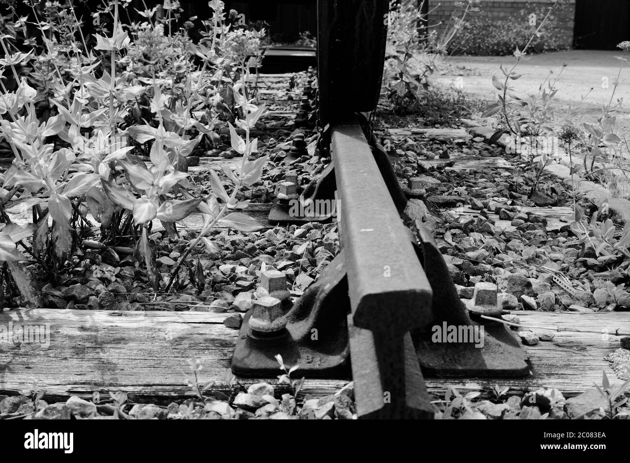 Vintage victorian railway track with huge train wheels in close up ...