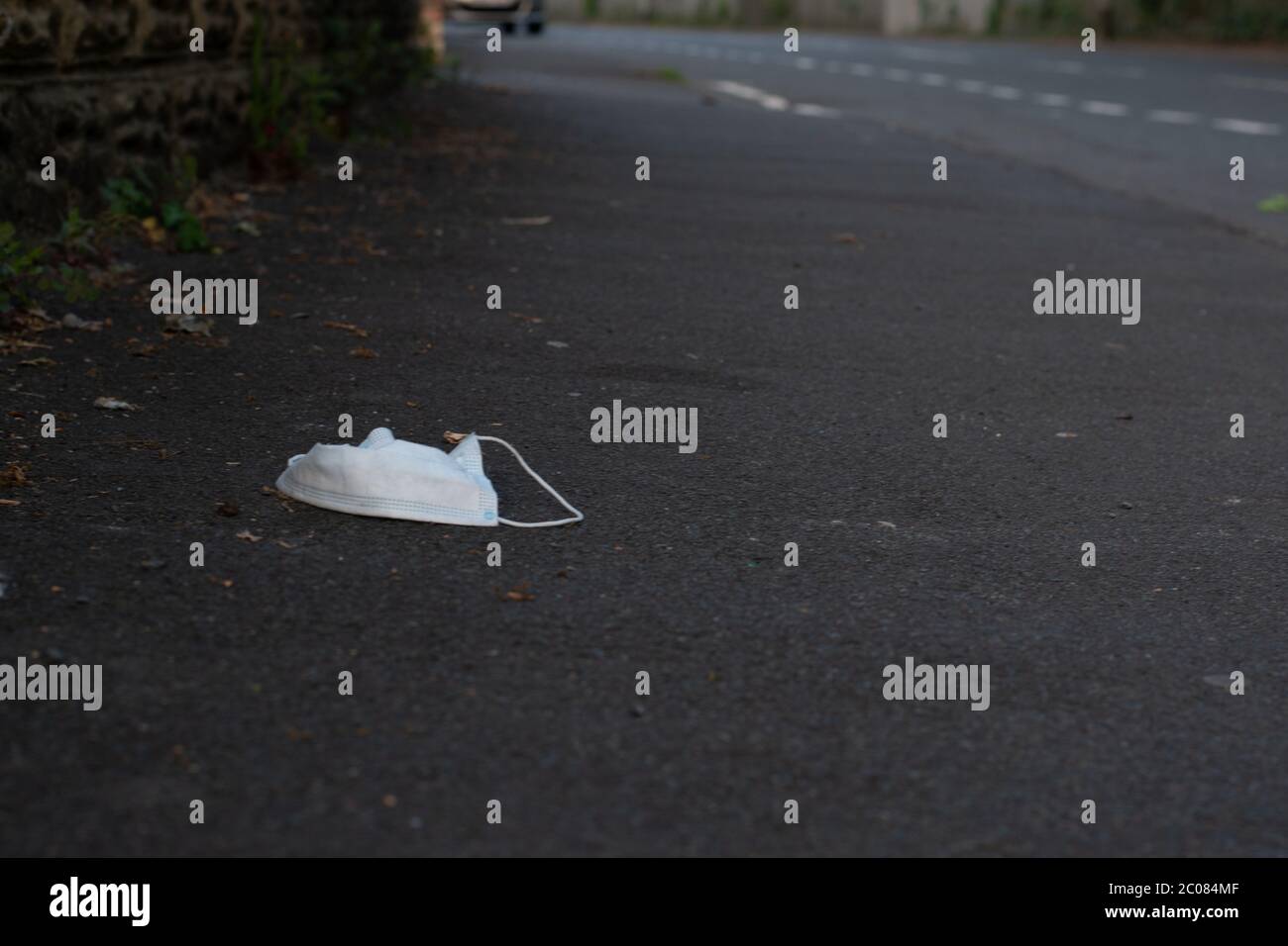 Waste single use medical mask hi-res stock photography and images - Alamy
