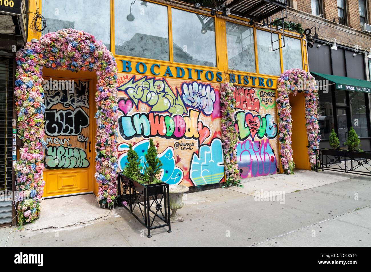 New York, NY - June 11, 2020: Local graffiti artists painted murals on ...