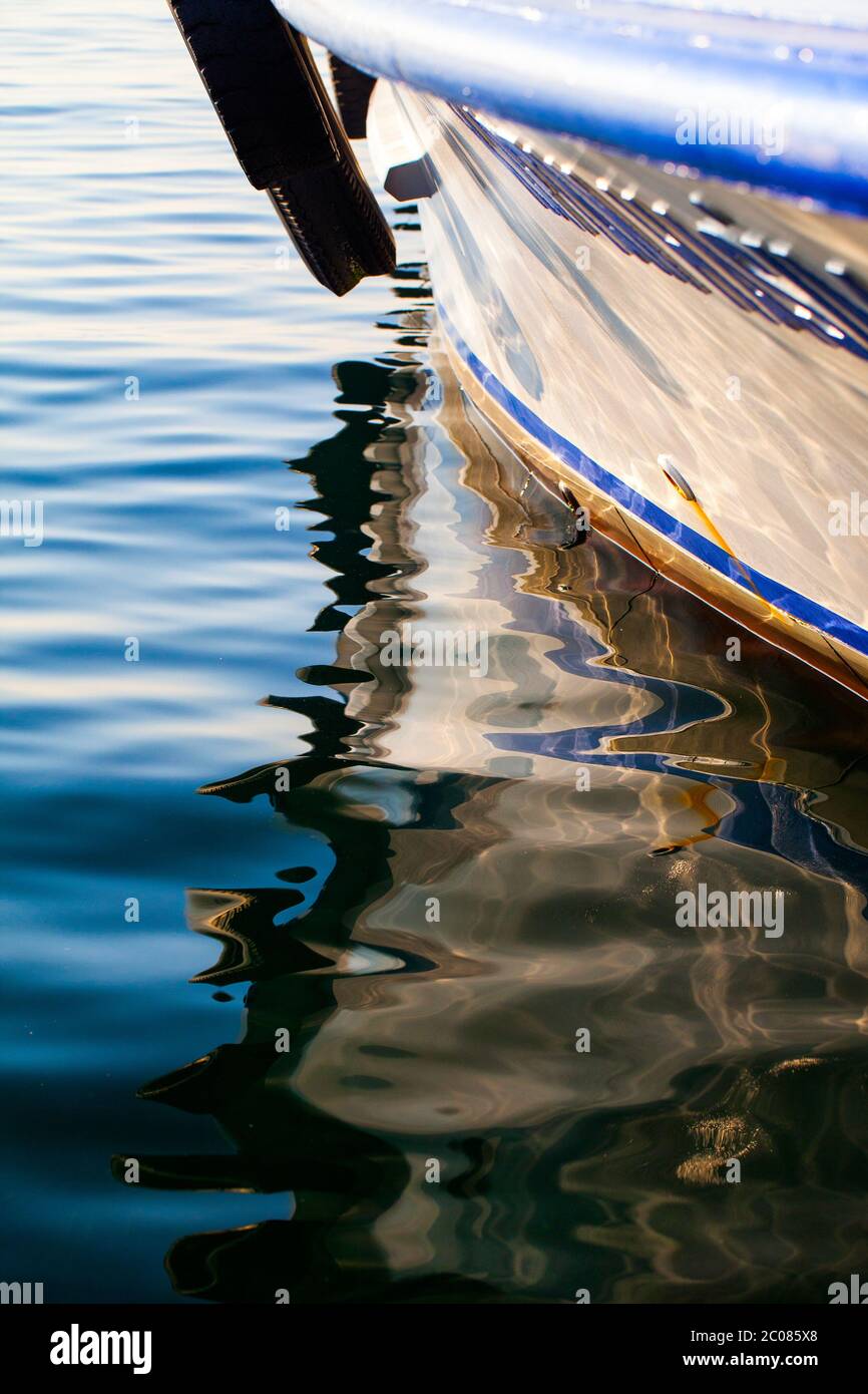 Boat Reflection on the Sea Water Photo Stock Photo - Alamy