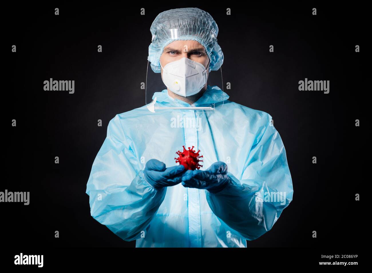 Photo of serious scientist guy doc virology center hold covid bacteria ...