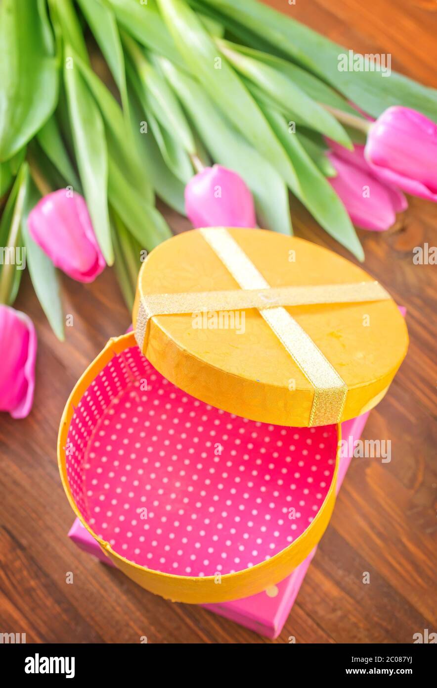 present and tulips Stock Photo - Alamy