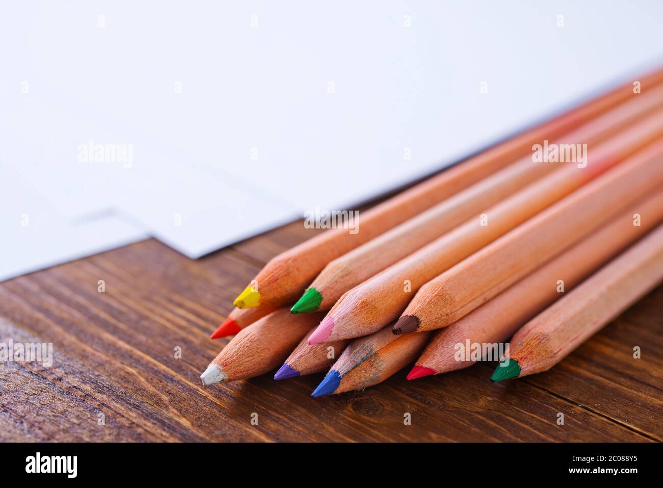 paper and color pencils Stock Photo - Alamy