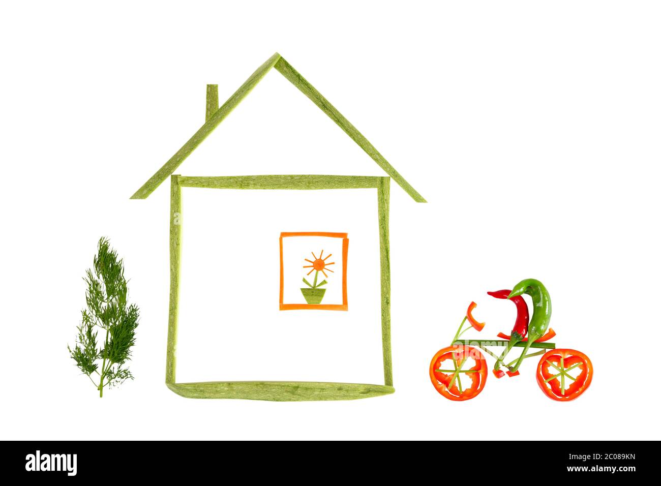 Healthy eating. House and funny little peppers Stock Photo - Alamy