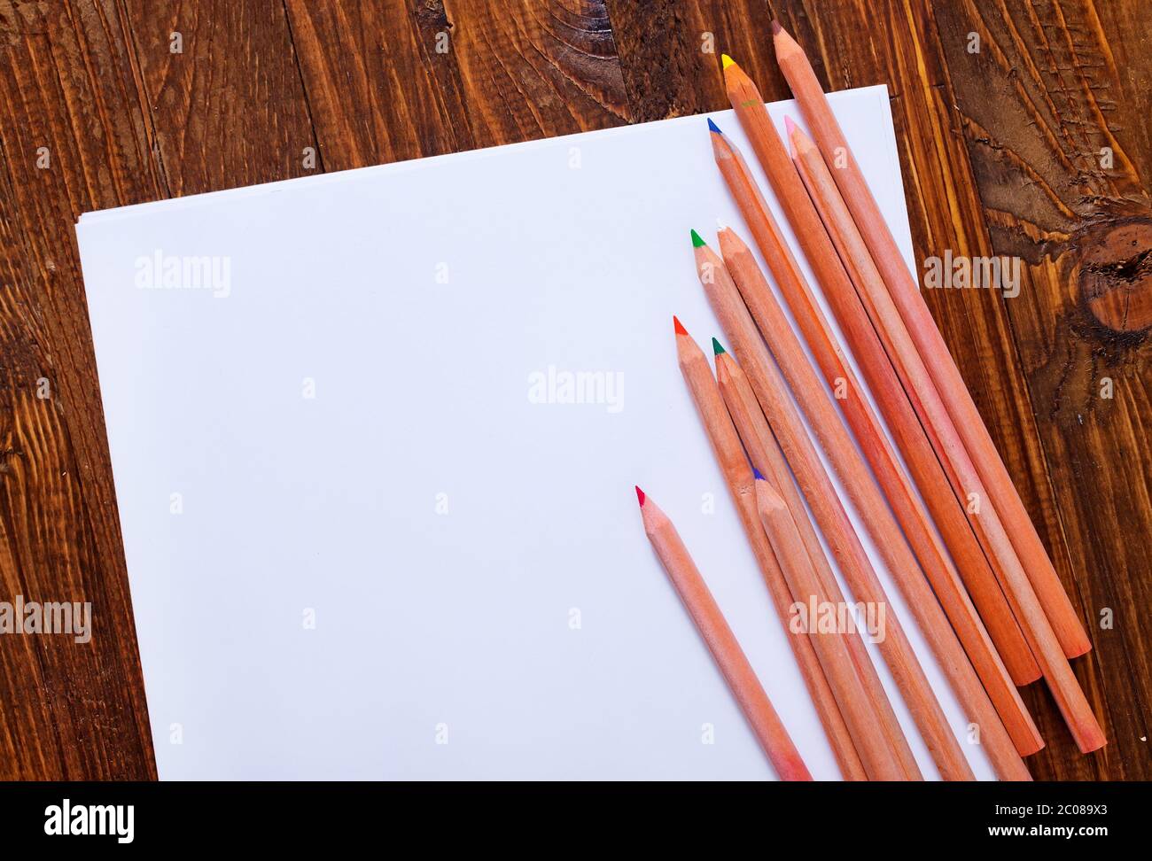paper and color pencils Stock Photo - Alamy