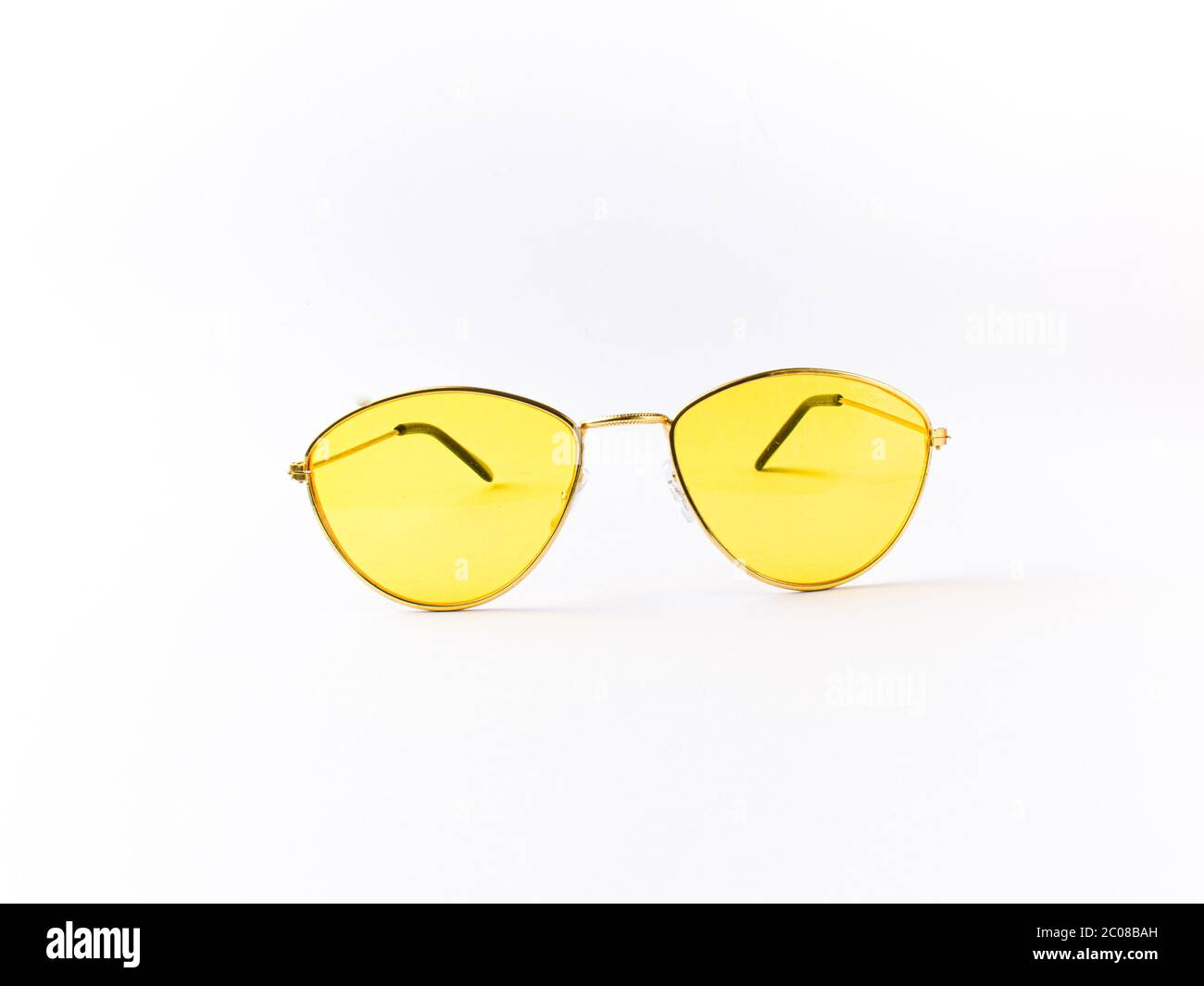 yellow sunglass frame isolated stock image Stock Photo - Alamy