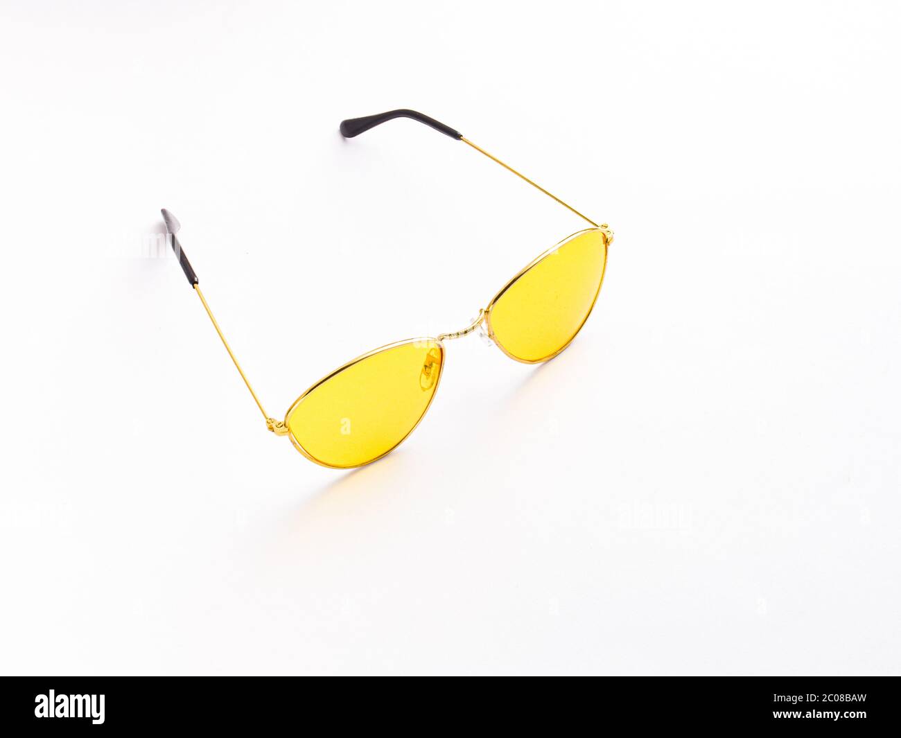 yellow sunglass frame isolated stock image Stock Photo - Alamy