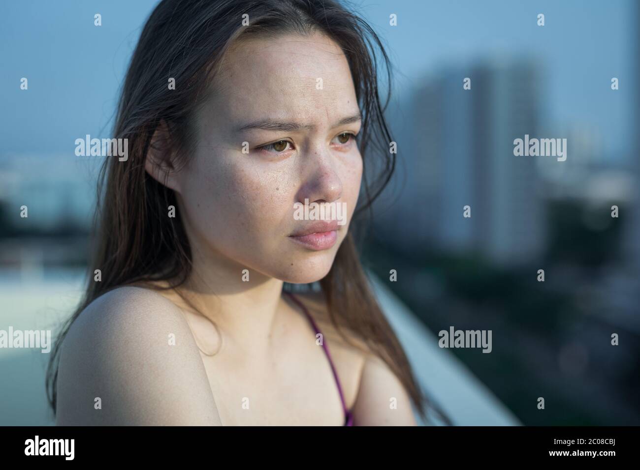 A young woman suffering from deep depression and heartache Stock Photo ...