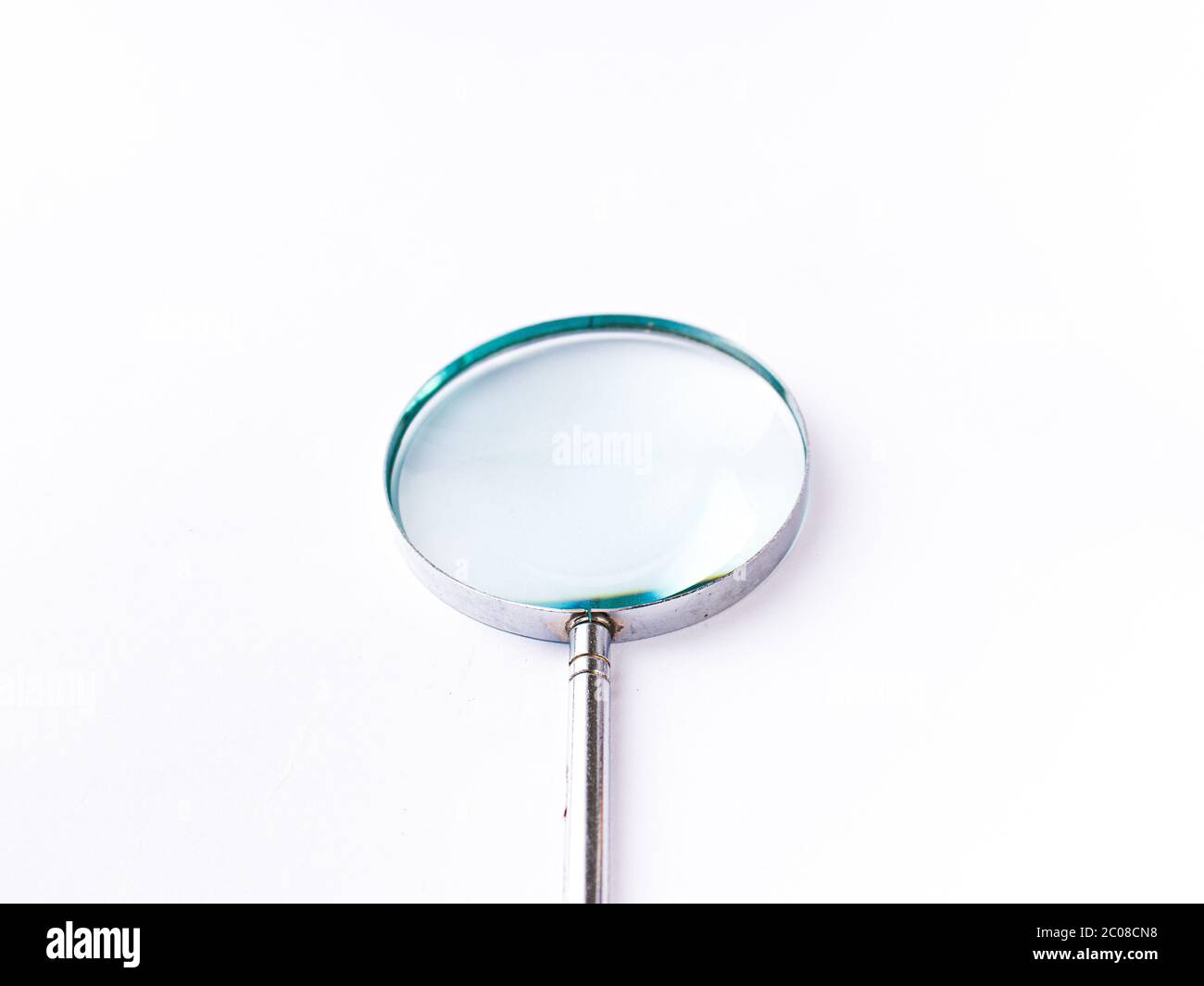 Magnifying class isolated stock image Stock Photo - Alamy