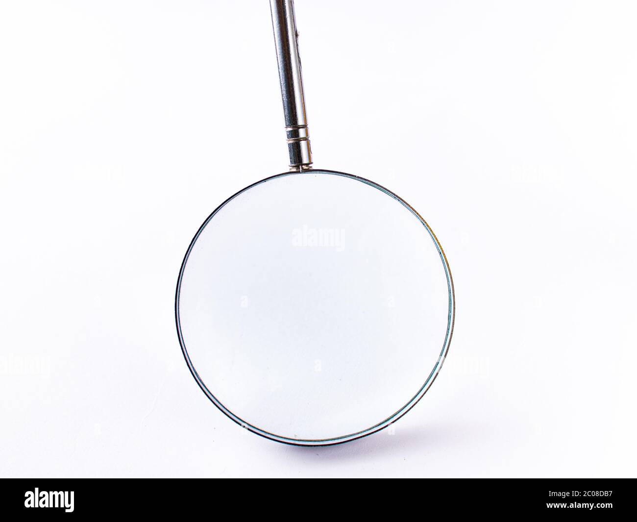 Magnifying class isolated stock image Stock Photo - Alamy