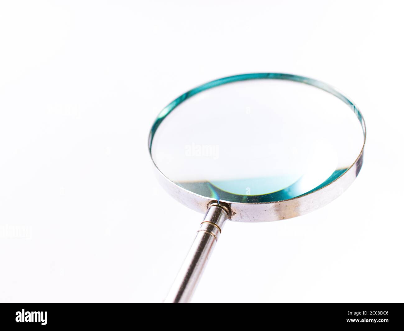 Magnifying class isolated stock image Stock Photo - Alamy