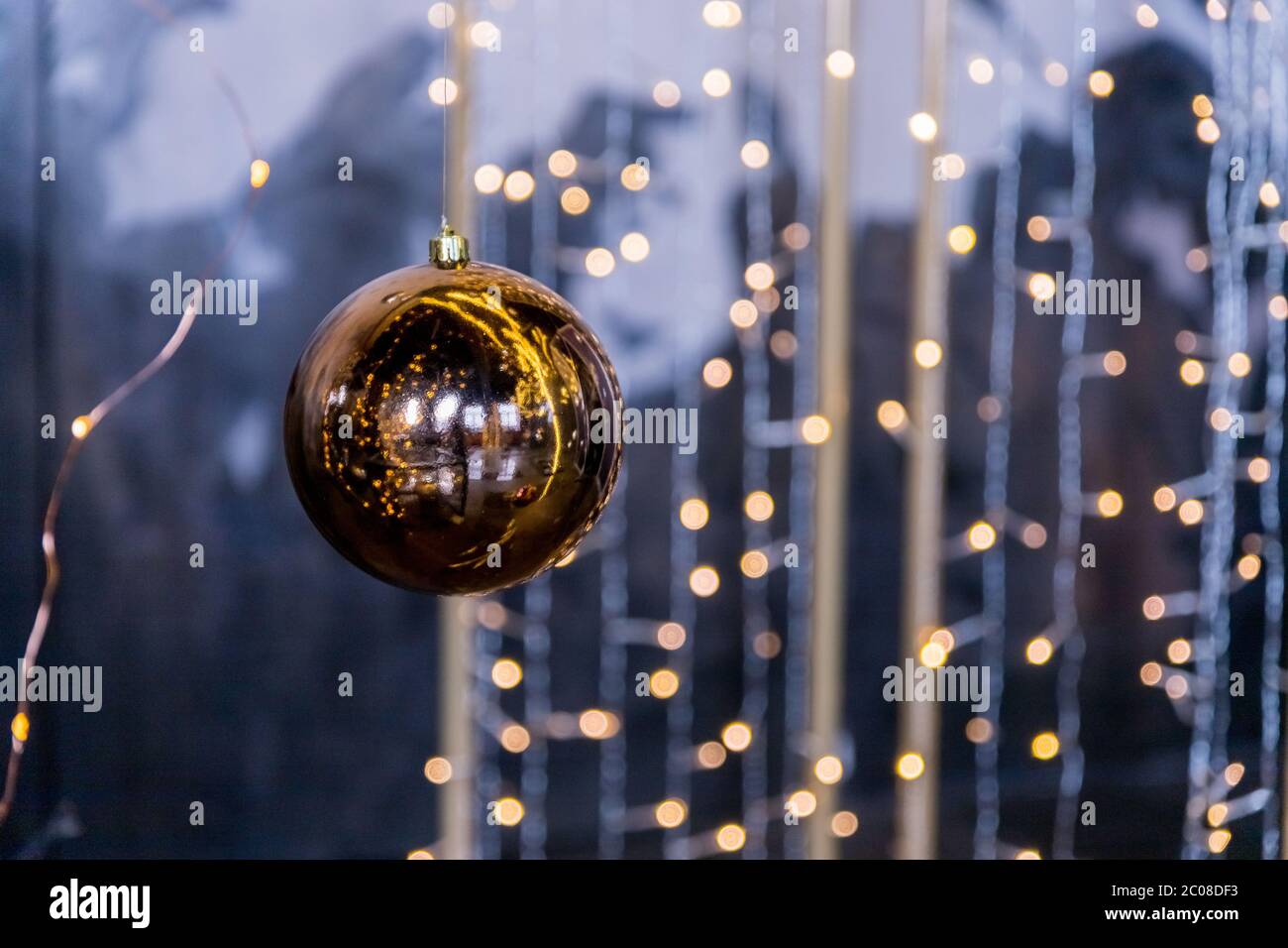 Christmas lights background with clear bauble decoration. Minimal ...