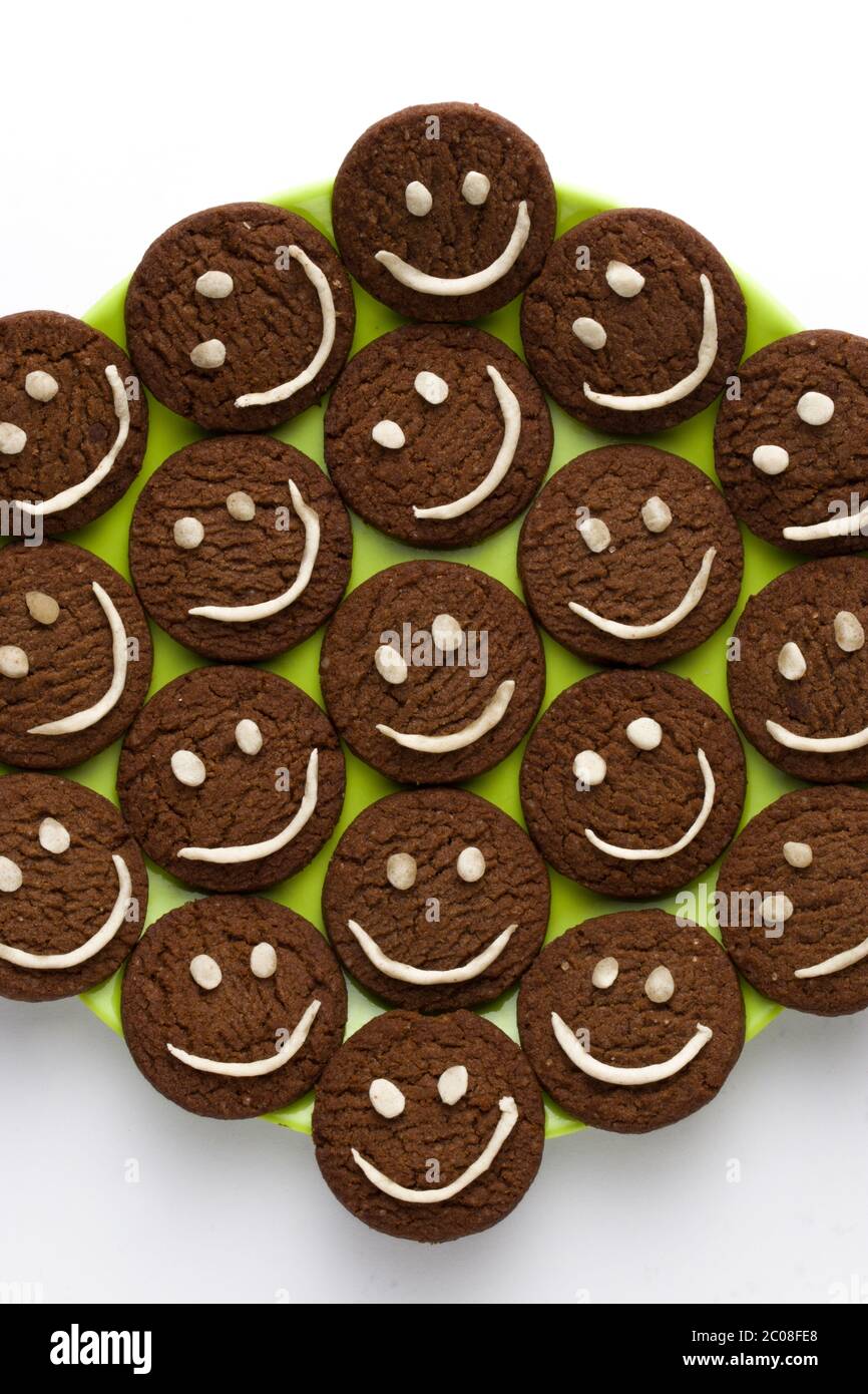 Chocolate cookies with smilies in top Stock Photo - Alamy