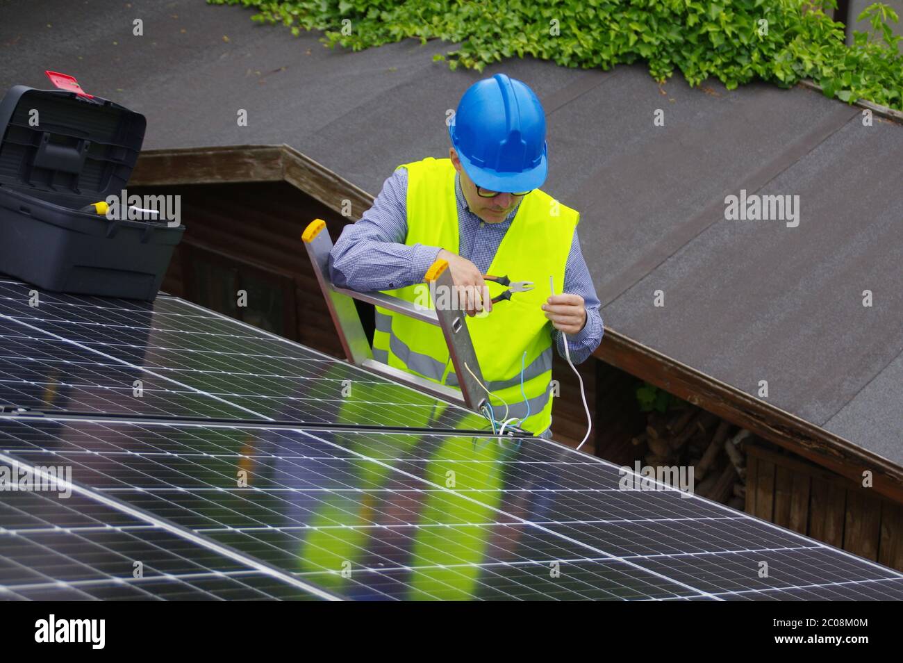 Installation and commissioning of solar panels. Renewable energy in a ...