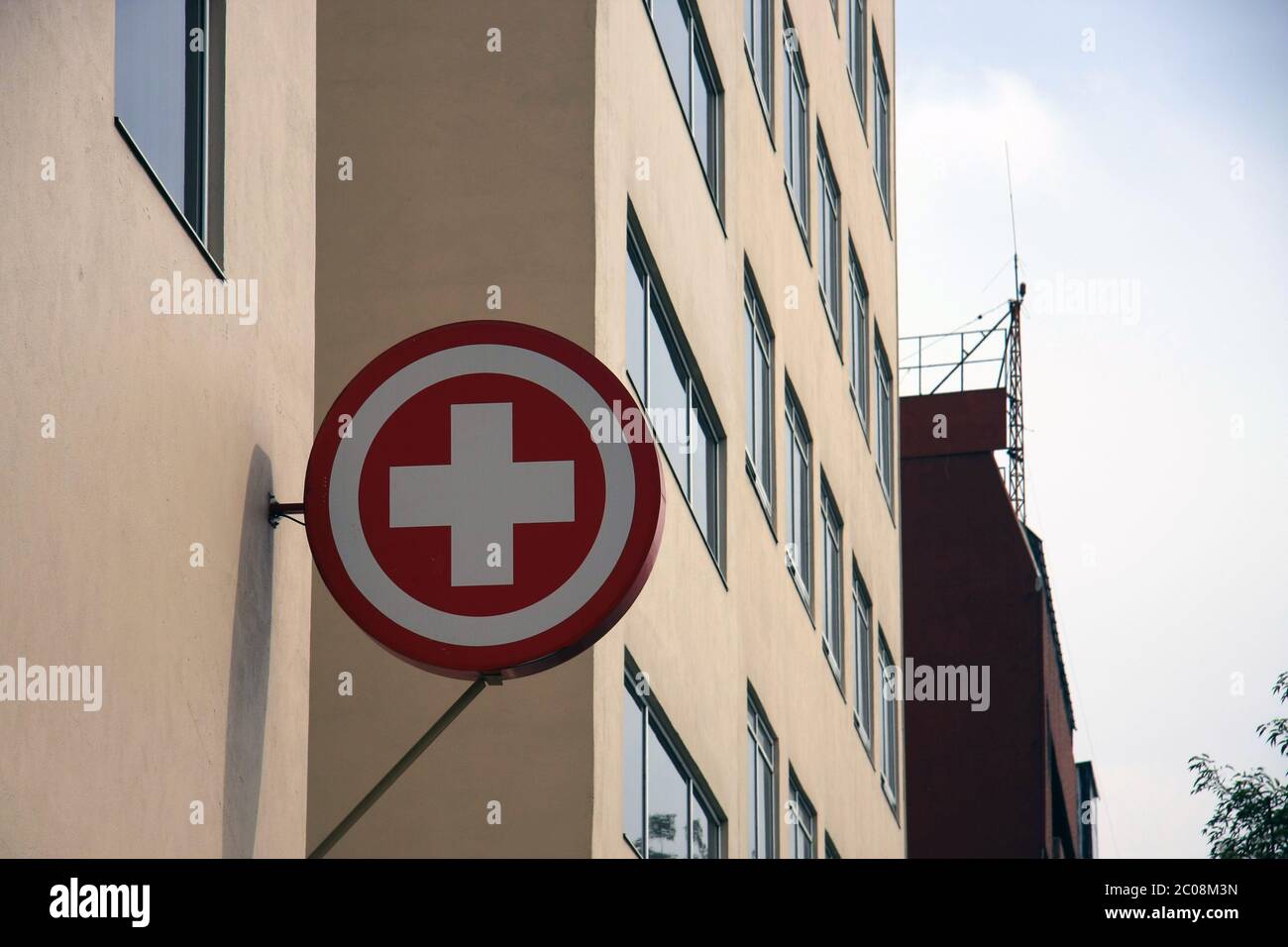 Red Cross First Aid/Medical Signage [Sign] hanging off side of a ...